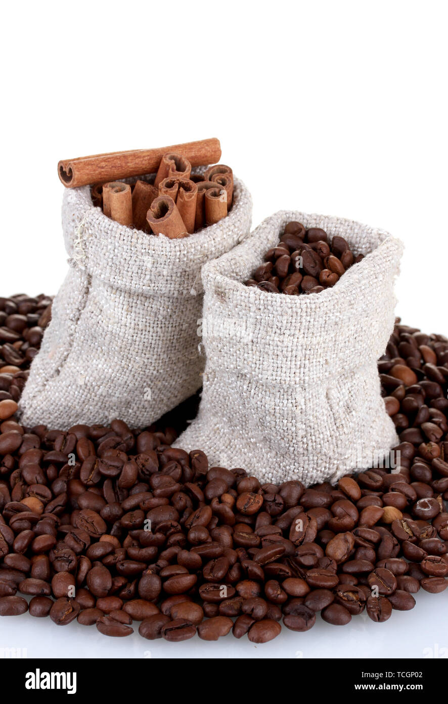 Coffee beans and cinnamon in canvas sacks isolated on white Stock Photo ...