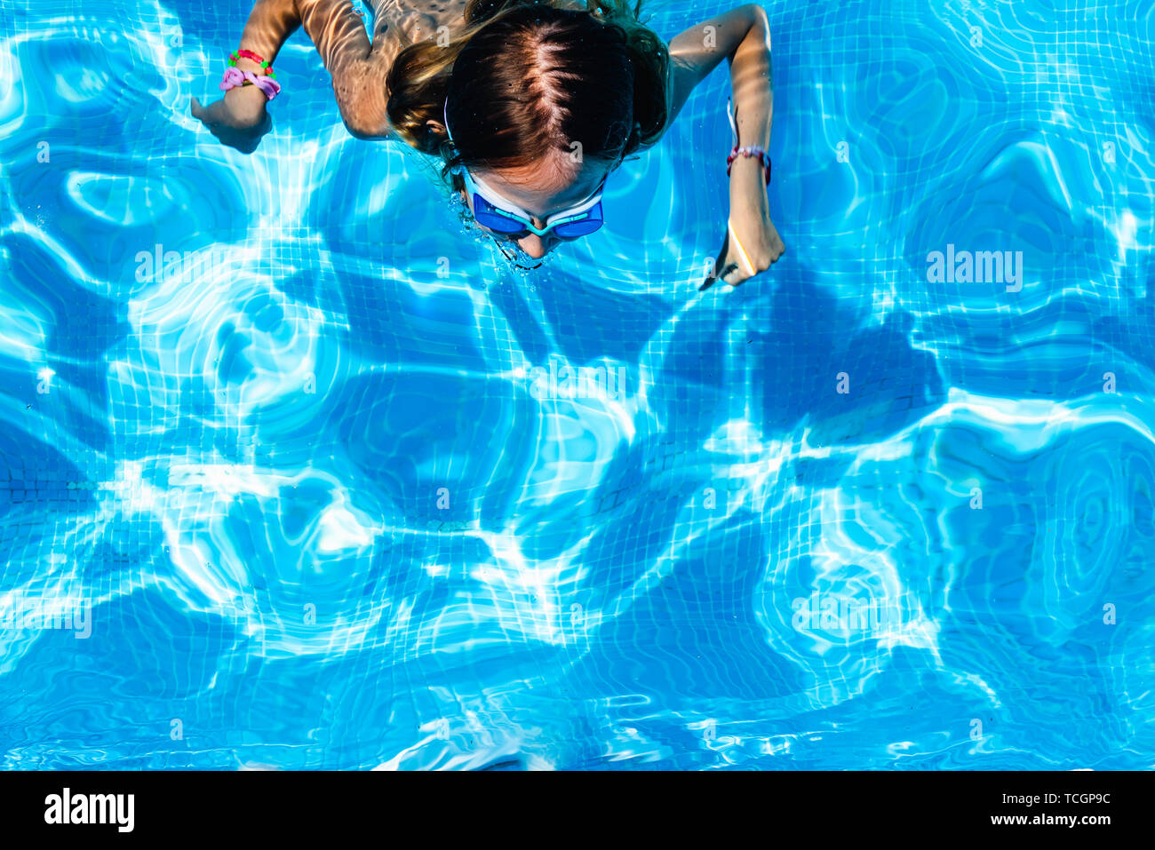 Woman dive pool splash hi-res stock photography and images - Alamy