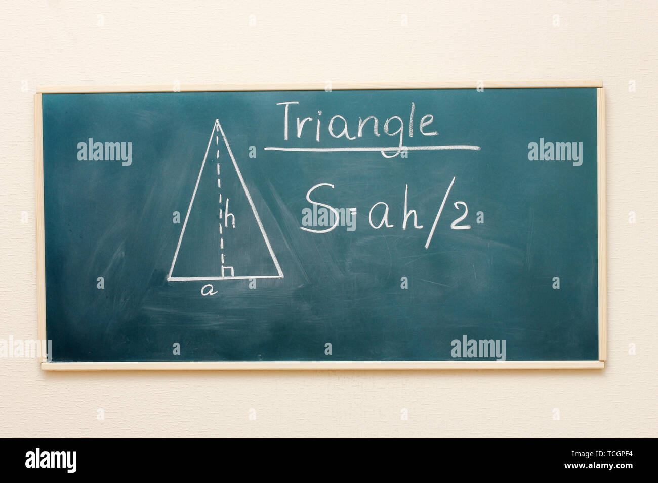 Math formulas written on the desk Stock Photo - Alamy