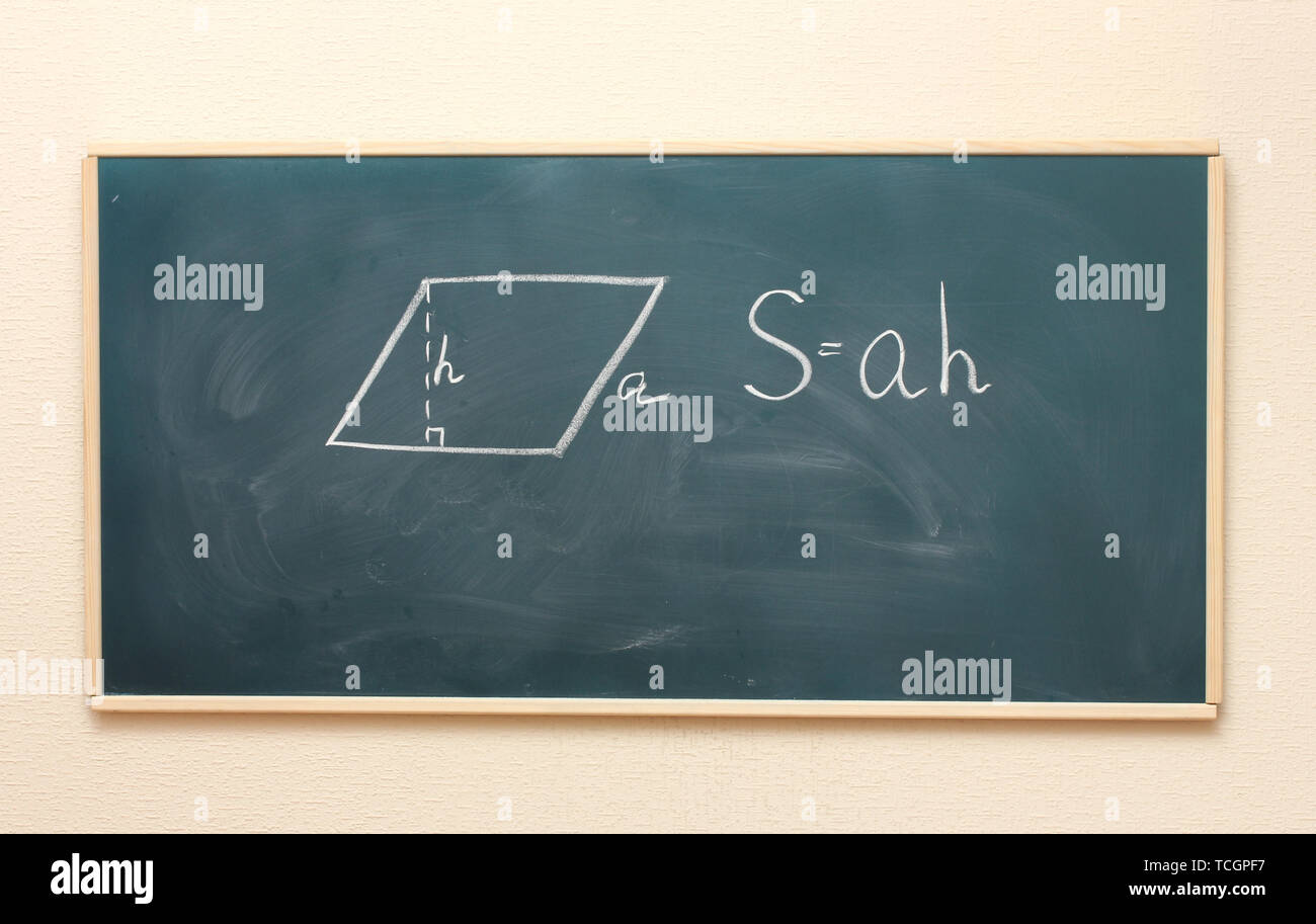 Math formulas written on the desk Stock Photo - Alamy
