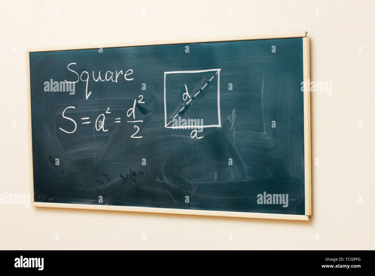 Math formulas written on the desk Stock Photo - Alamy