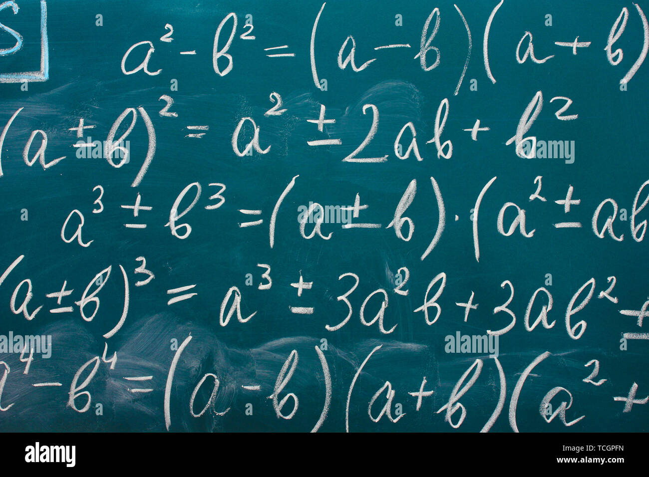 Math formulas written on the desk Stock Photo - Alamy
