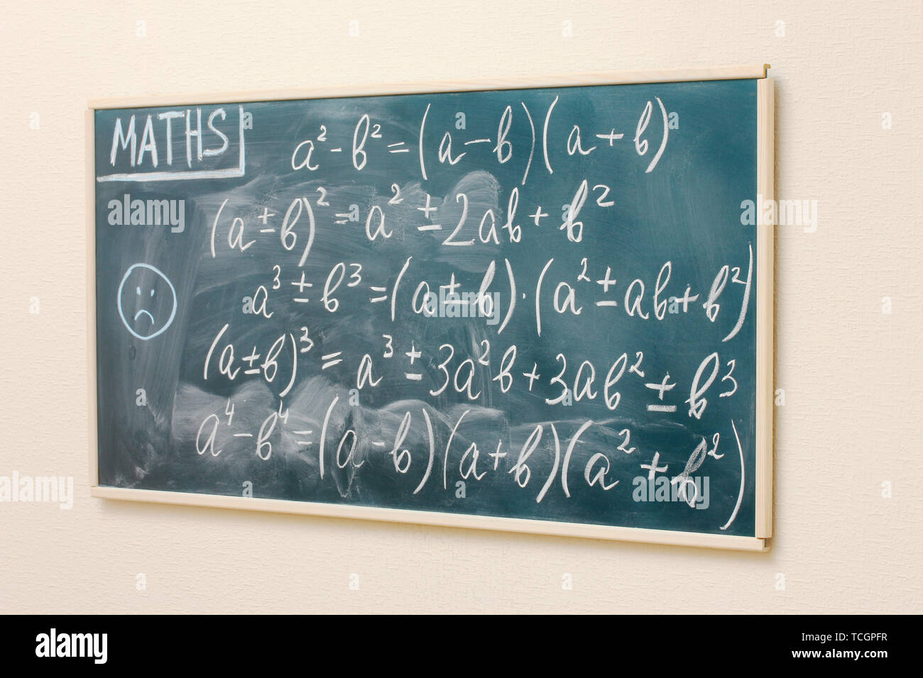 Math formulas written on the desk Stock Photo - Alamy