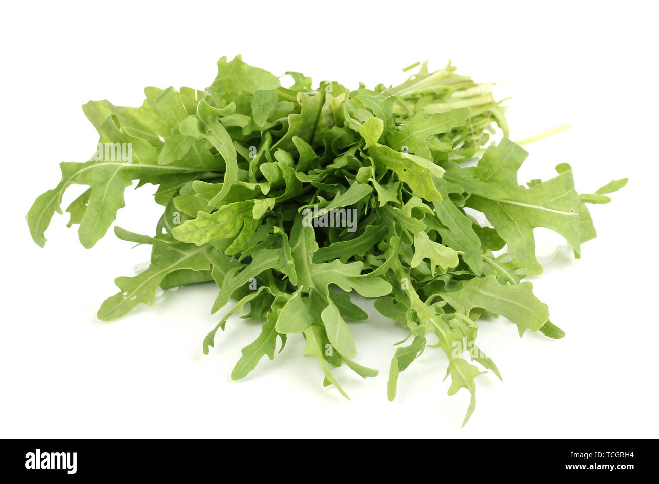 Fresh rucola salad or rocket lettuce leaves isolated on white Stock ...