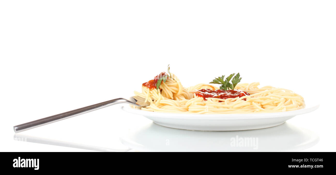 Italian spagetti cooked in a white plate with fork isolated on white ...
