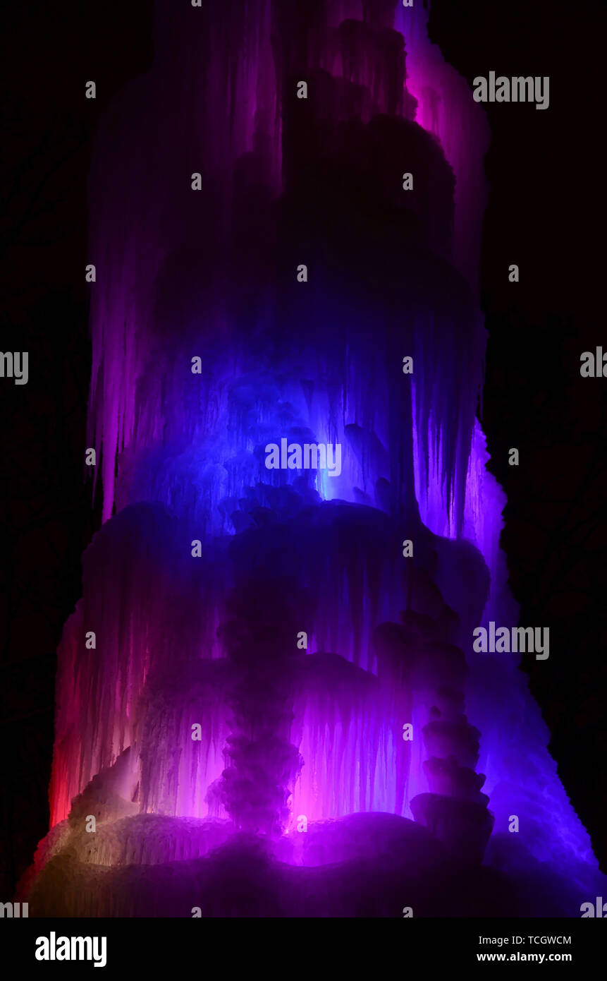 Huge ice icicles. Fragment of large blocks of ice frozen waterfall of ...