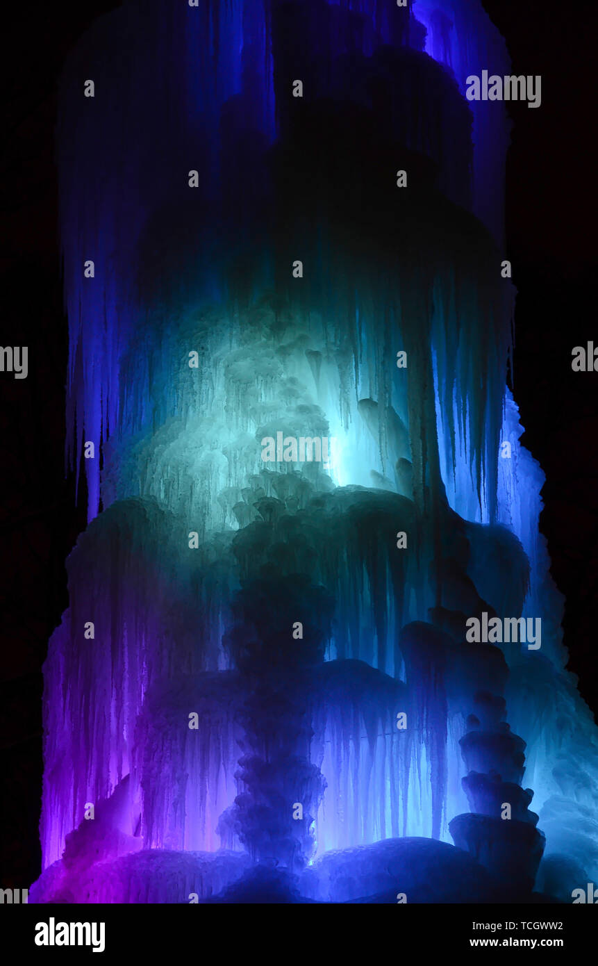 Huge ice icicles. Fragment of large blocks of ice frozen waterfall of ...