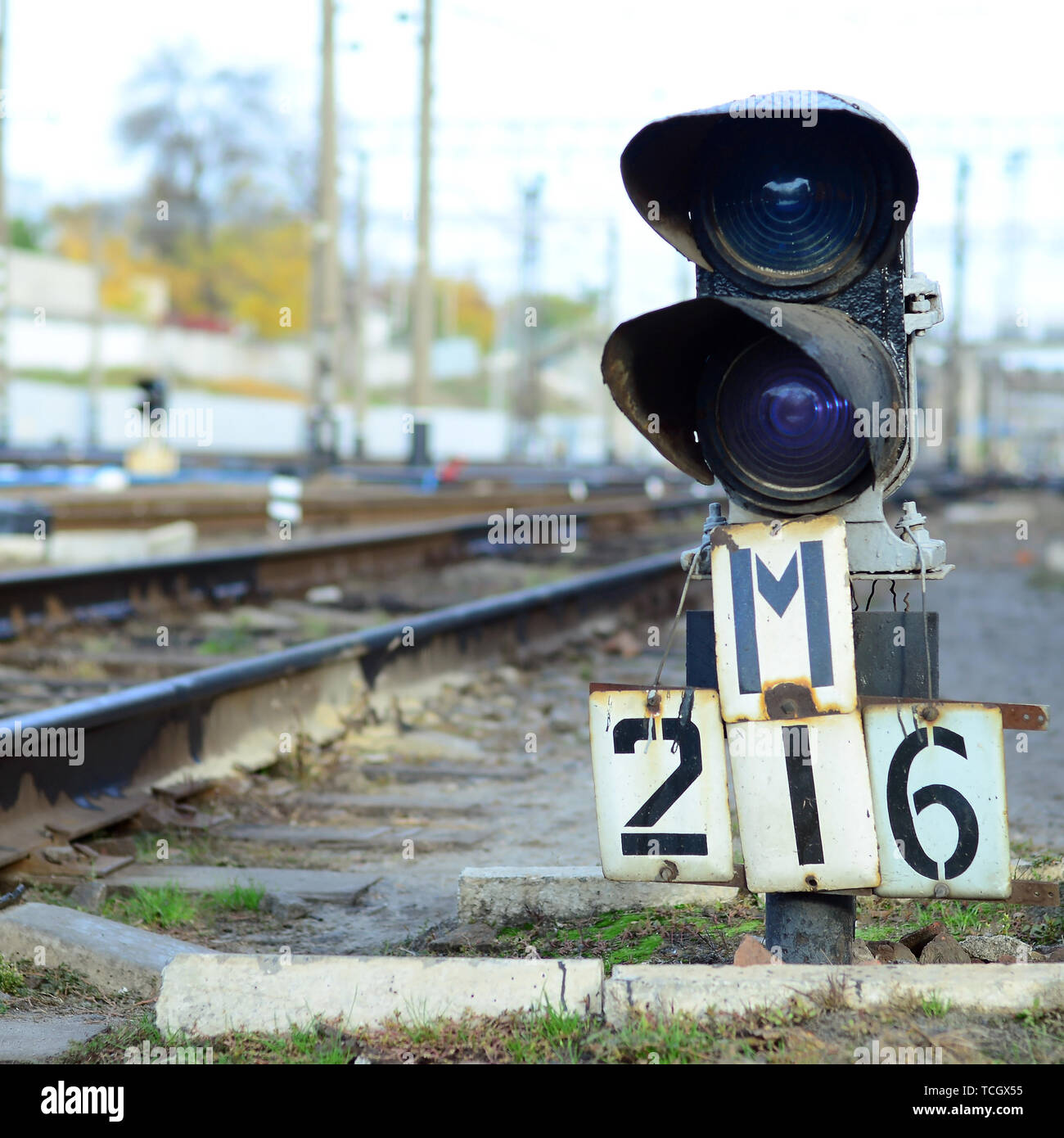 Railway semaphore traffic light against the background of a day railway ...