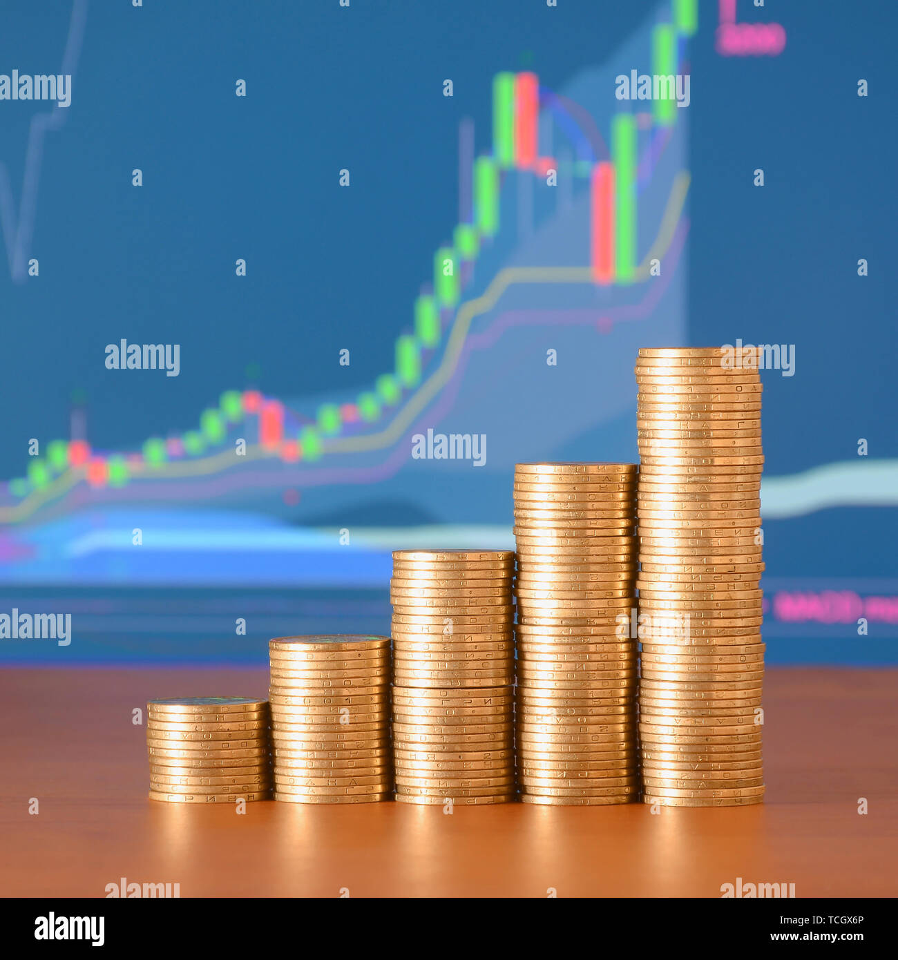 Golden coin stacks arranged as a graph. Increasing columns of coins ...