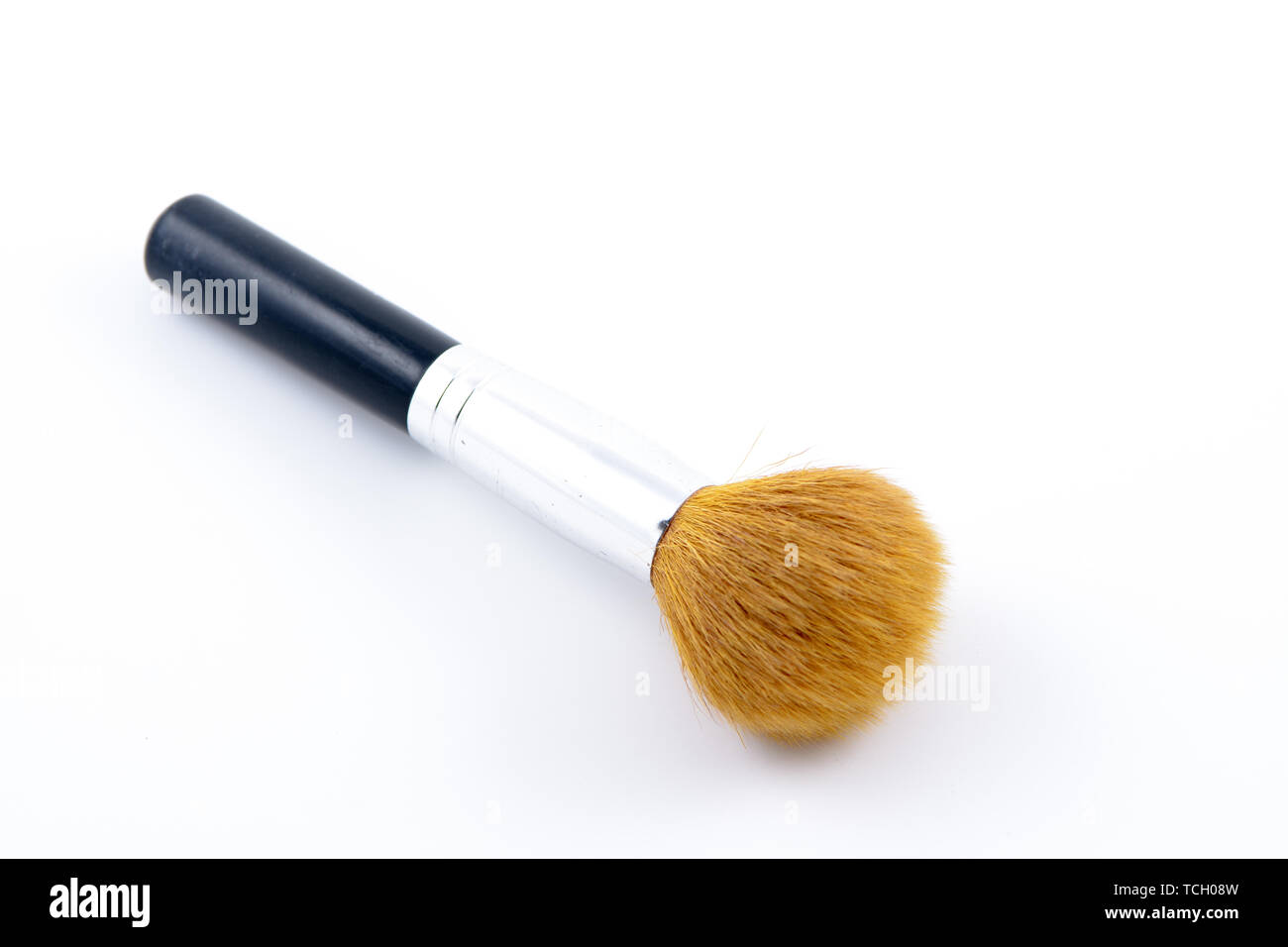 Visage brush for makeup with soft fluff lying on white background Stock ...