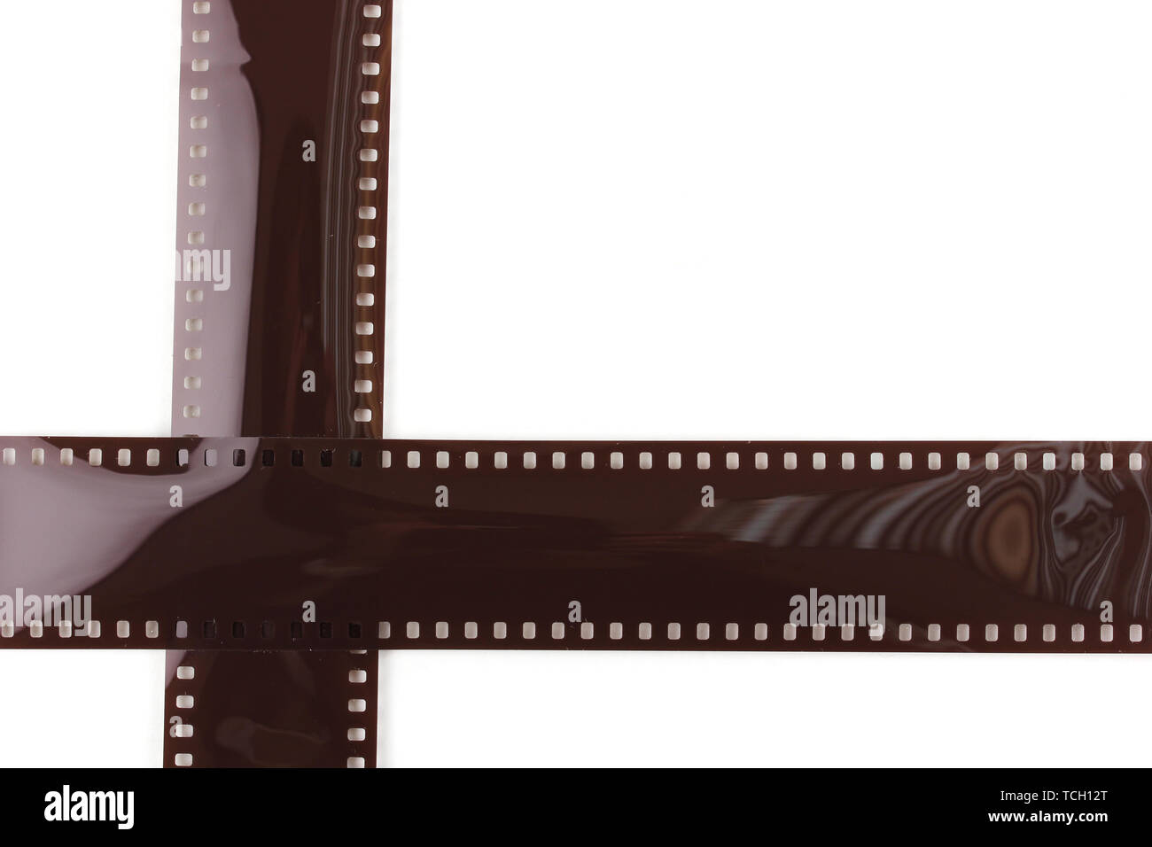 Photo film isolated on white Stock Photo - Alamy