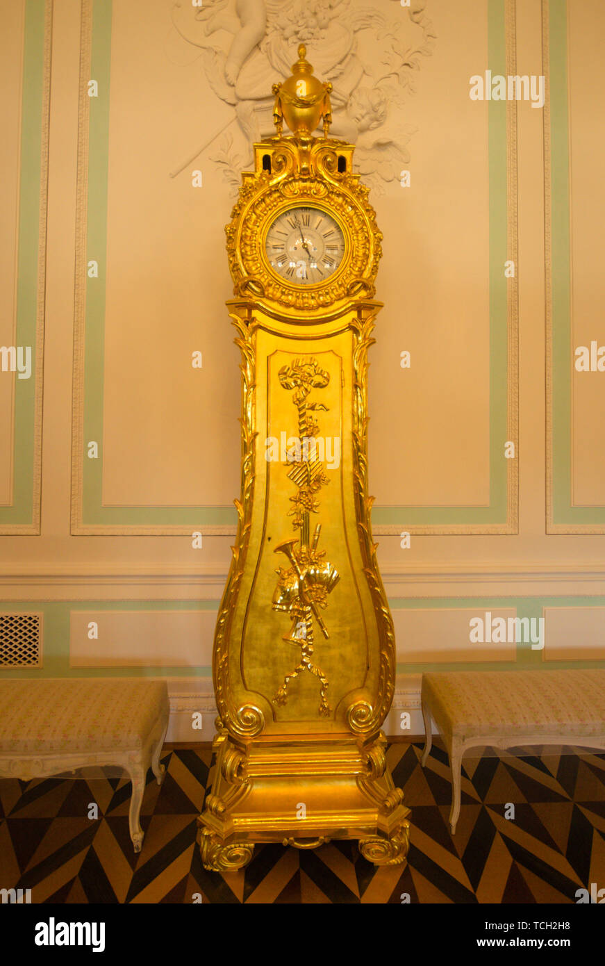 A standing clock on display at the Grand Palace of Peterhof ...