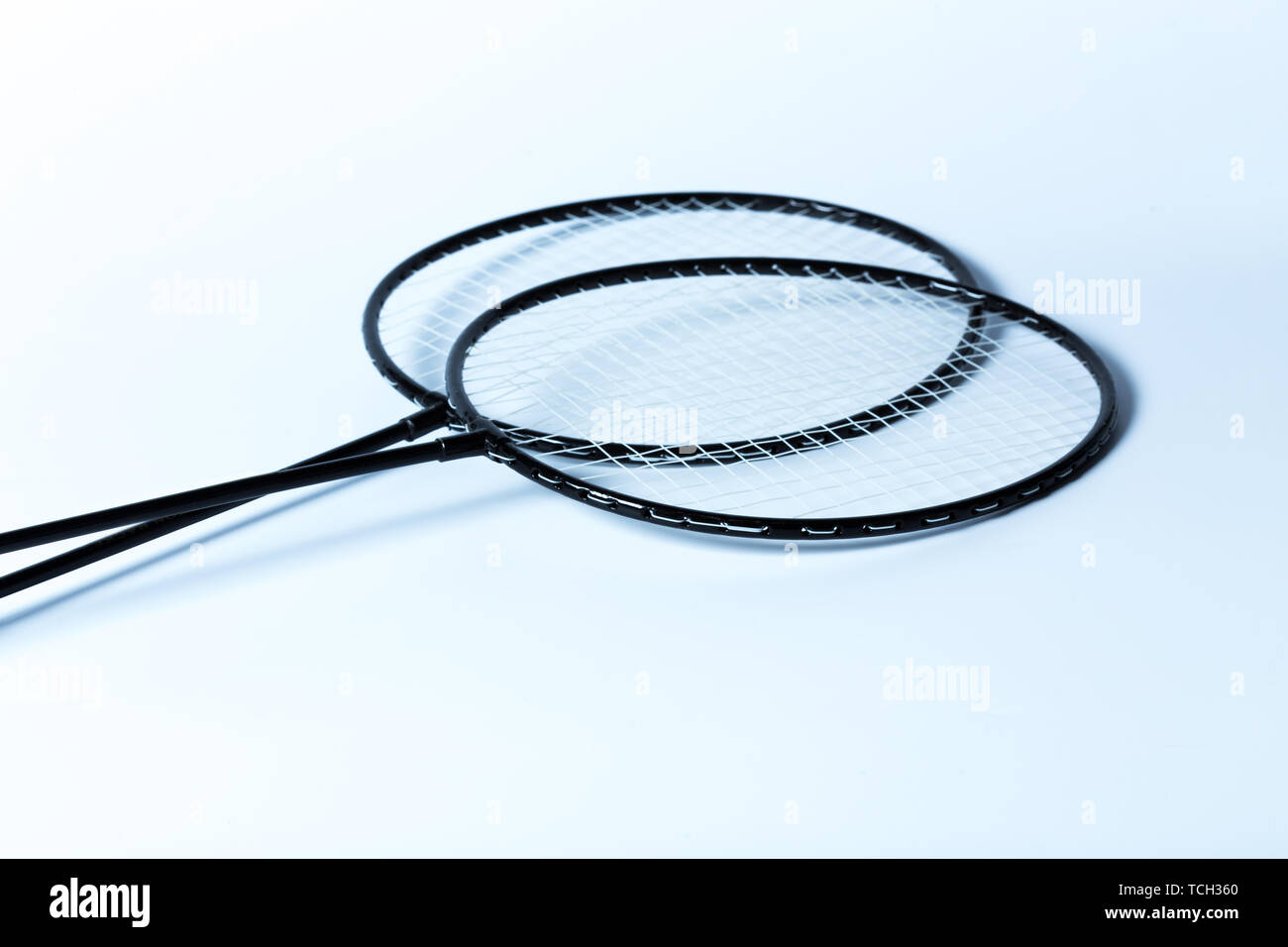Badminton rackets on white Stock Photo - Alamy