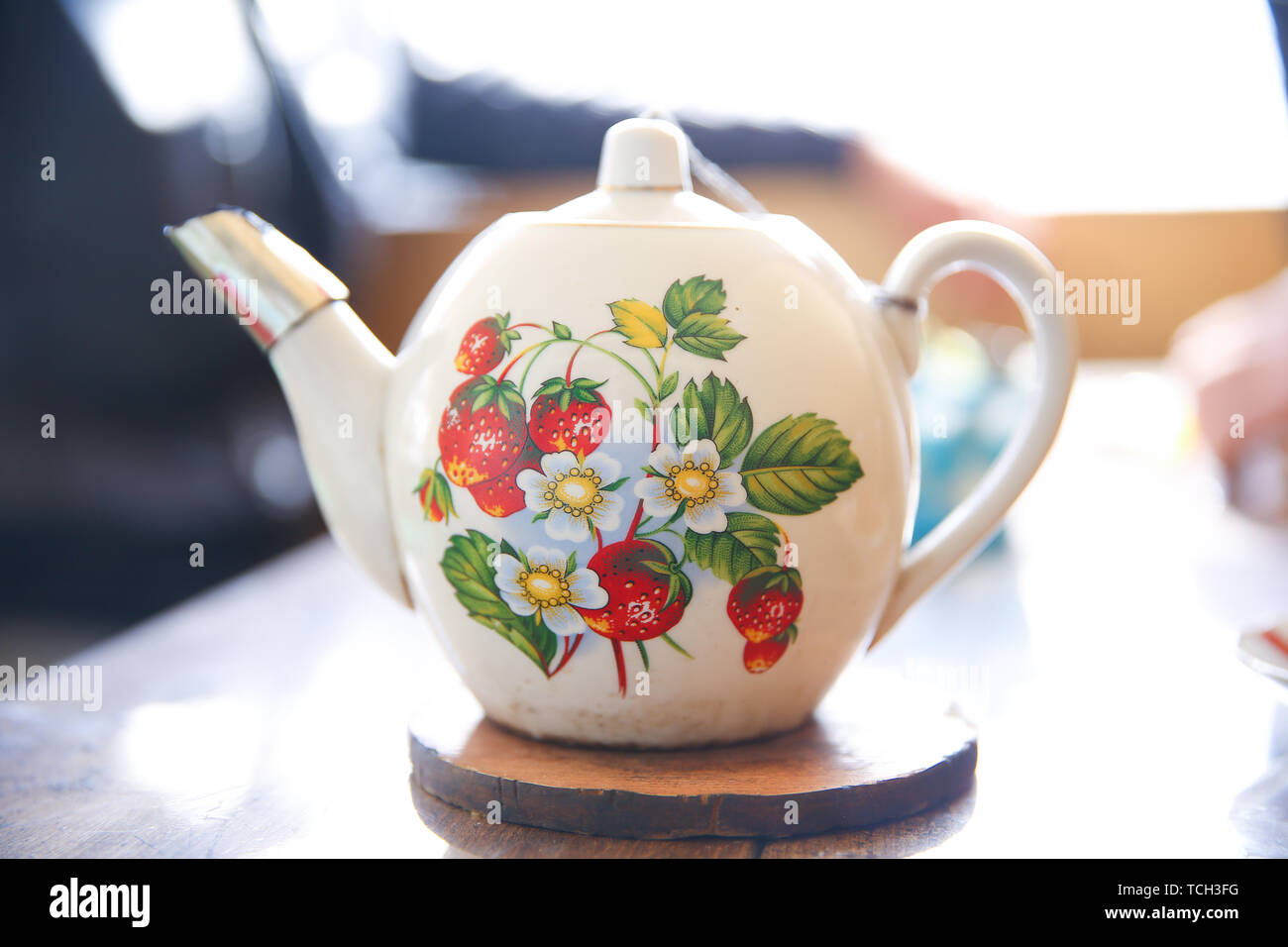 Stack of antique ceramic teapot selectiv focuse Stock Photo - Alamy