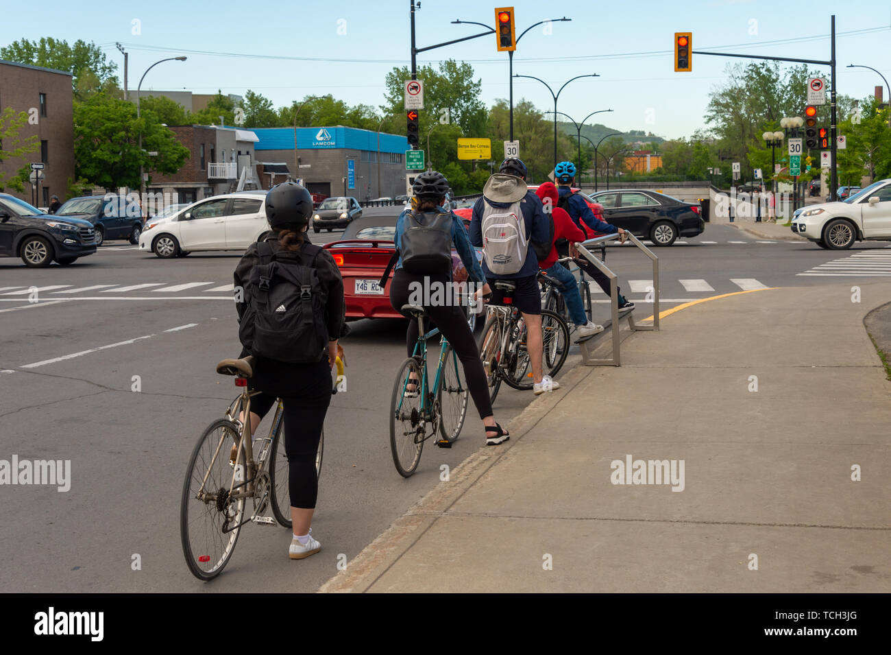 Montreal, Canada - 7 June 2019: Cyclists waiting at a red light on ...
