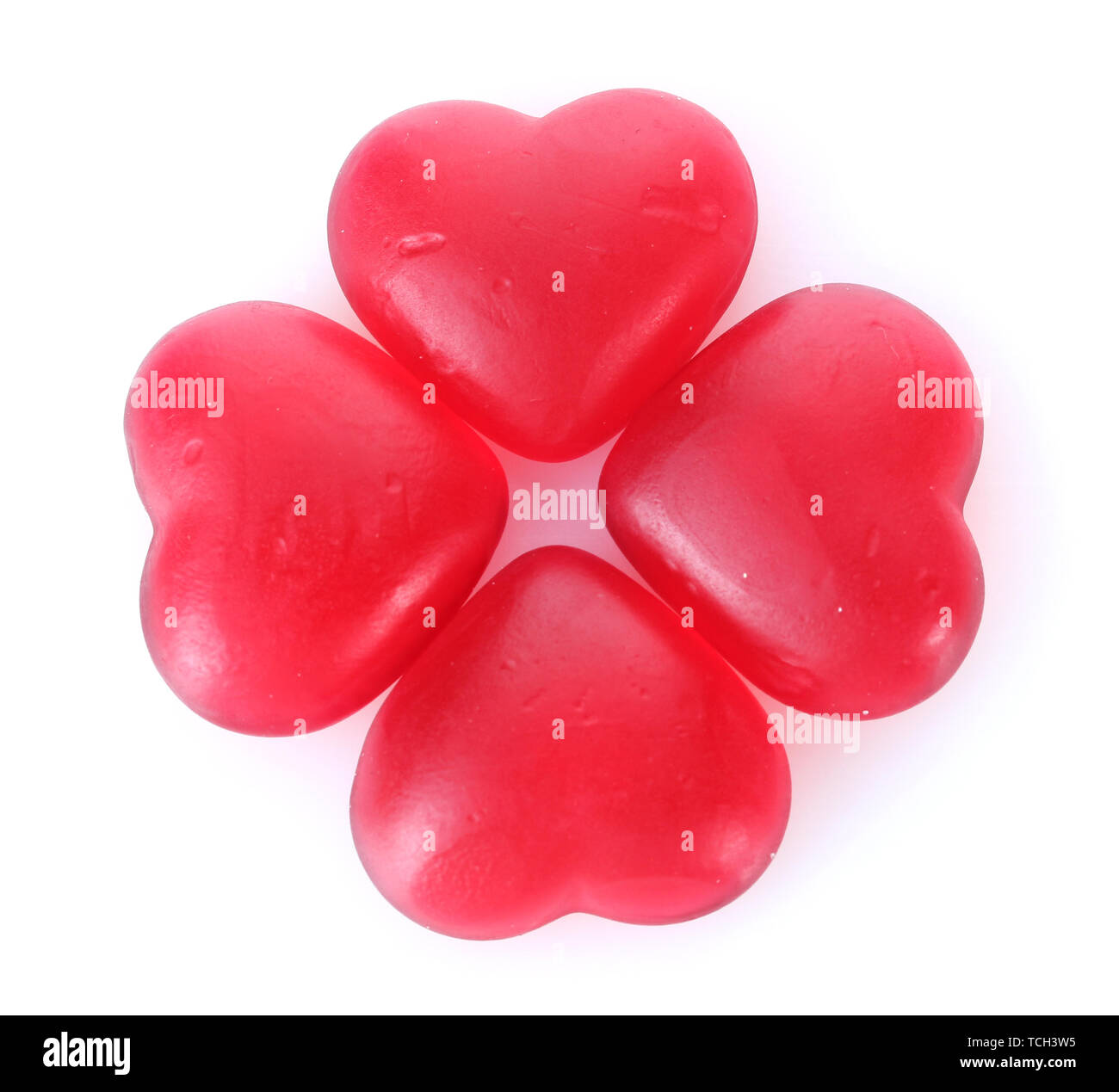 red candy hearts isolated on white Stock Photo - Alamy