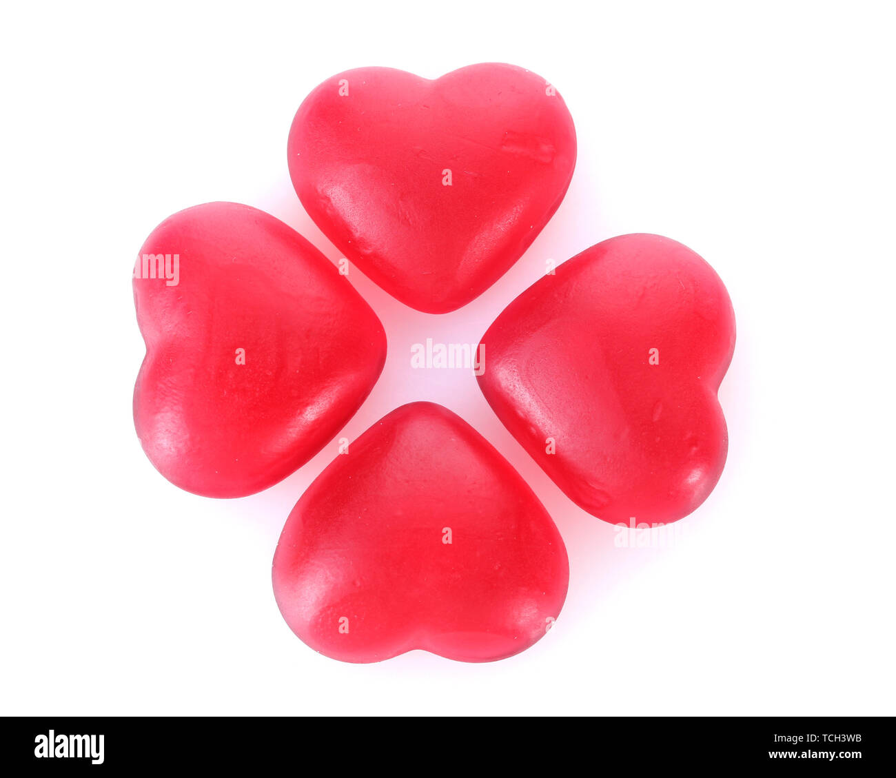 red candy hearts isolated on white Stock Photo - Alamy