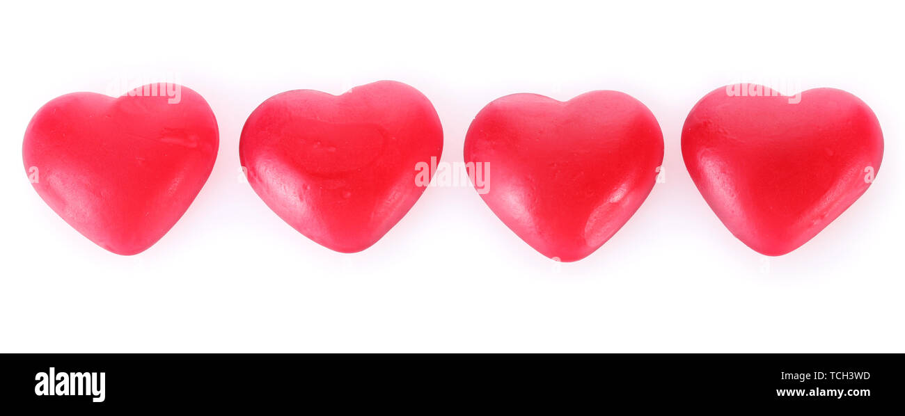 red candy hearts isolated on white Stock Photo - Alamy