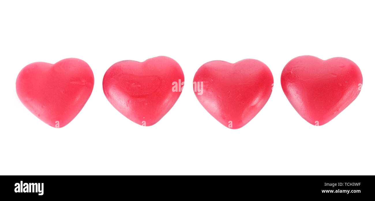 red candy hearts isolated on white Stock Photo - Alamy
