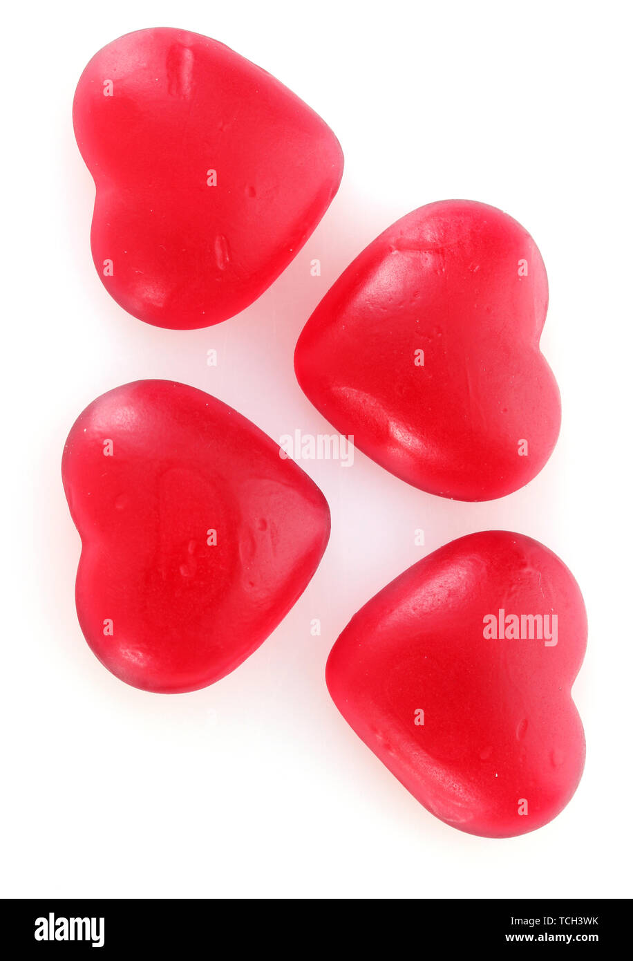red candy hearts isolated on white Stock Photo - Alamy