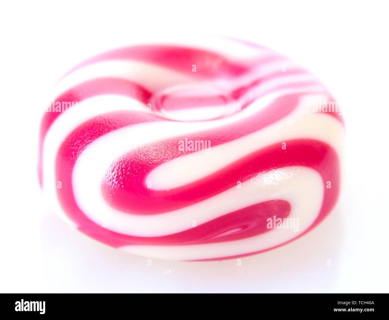 striped fruit candy isolated on white Stock Photo - Alamy