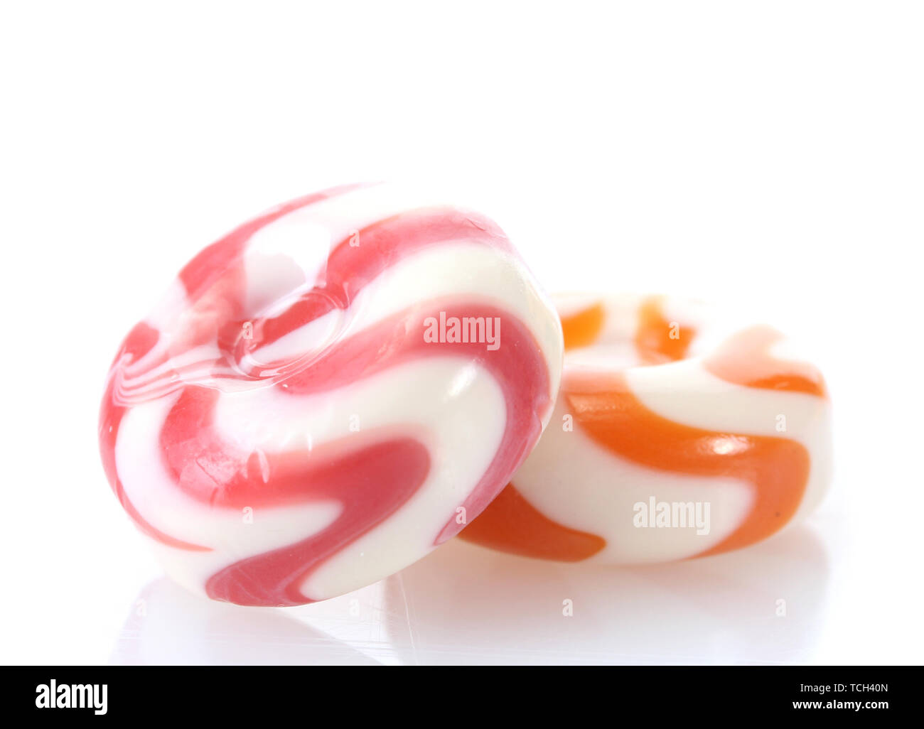 striped fruit candies isolated on white Stock Photo - Alamy