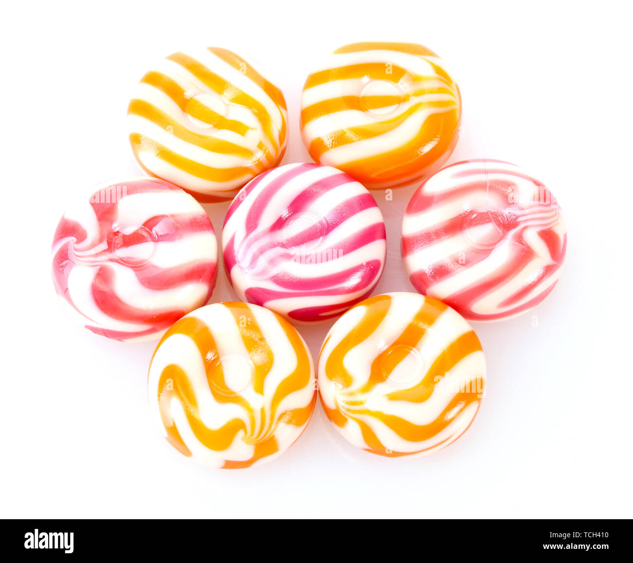 striped fruit candies isolated on white Stock Photo - Alamy