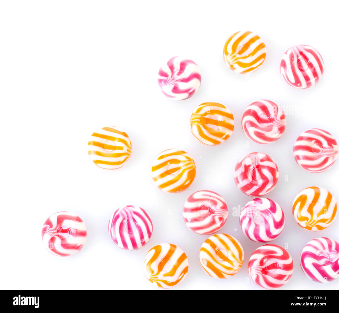 striped fruit candies isolated on white Stock Photo - Alamy