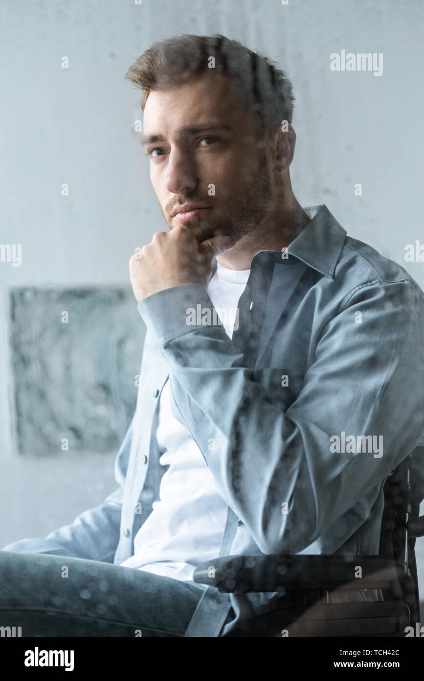 selective focus of sad disabled man on wheelchair Stock Photo - Alamy