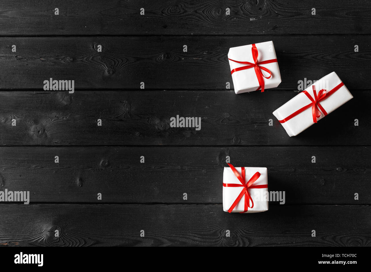 various gift boxes on wooden table, top view Stock Photo - Alamy