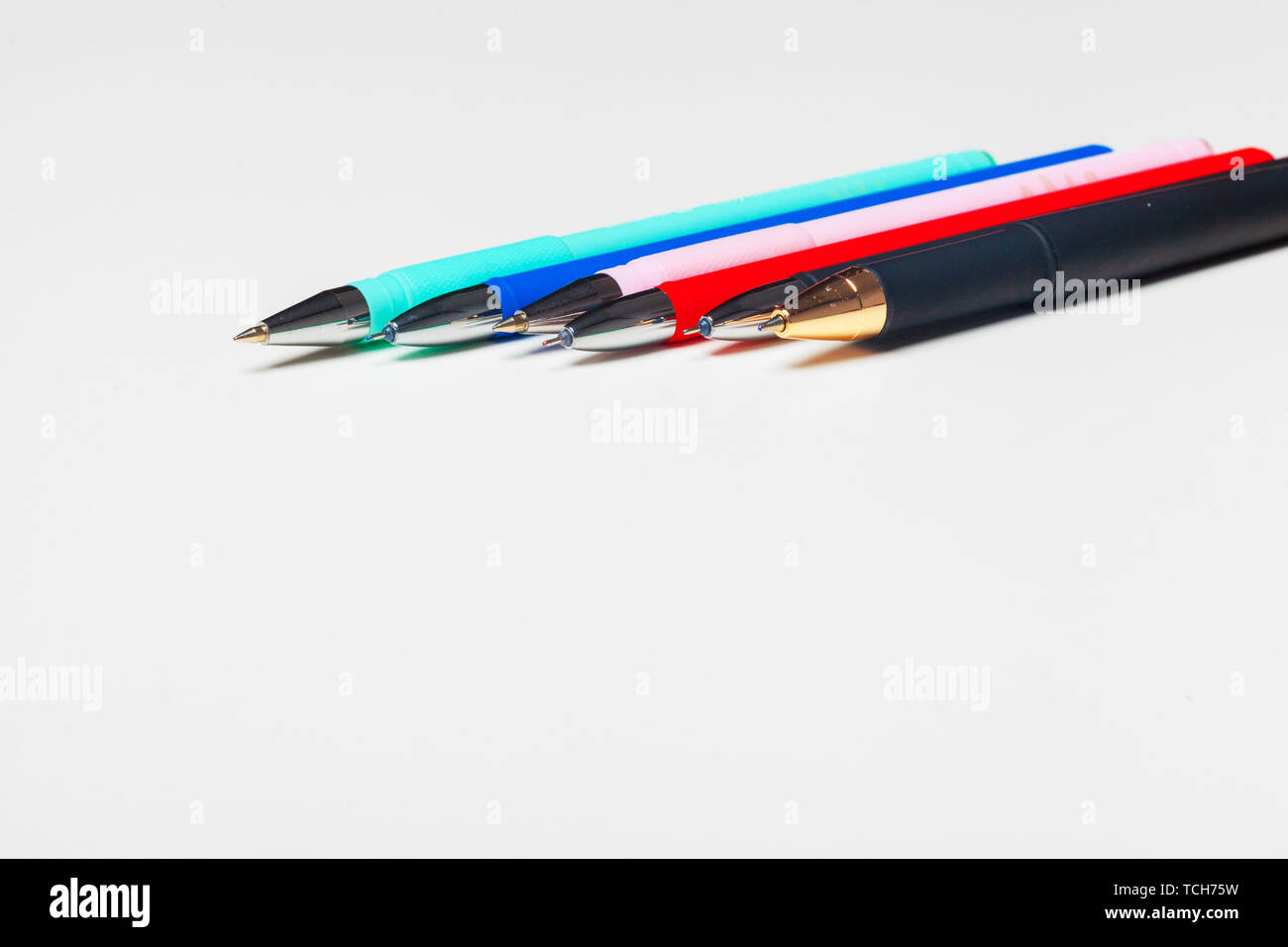 different colors pens isolated on the white background Stock Photo - Alamy