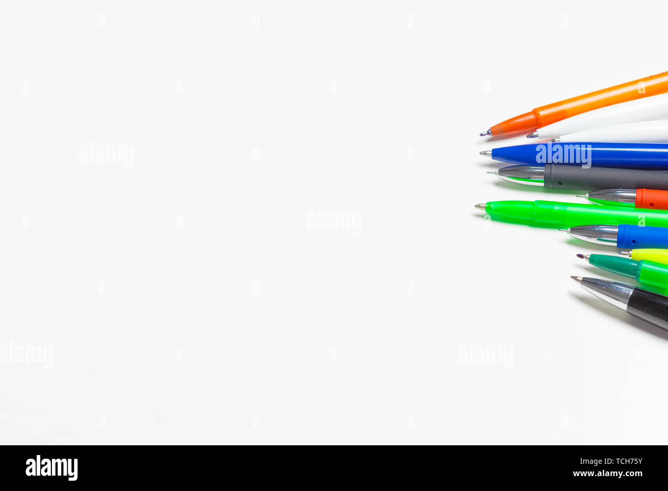 different colors pens isolated on the white background Stock Photo - Alamy