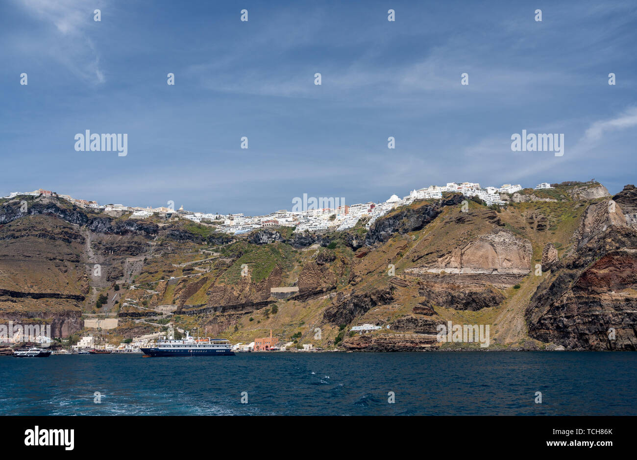 Fira port on volcanic caldera island of Santorini Stock Photo - Alamy
