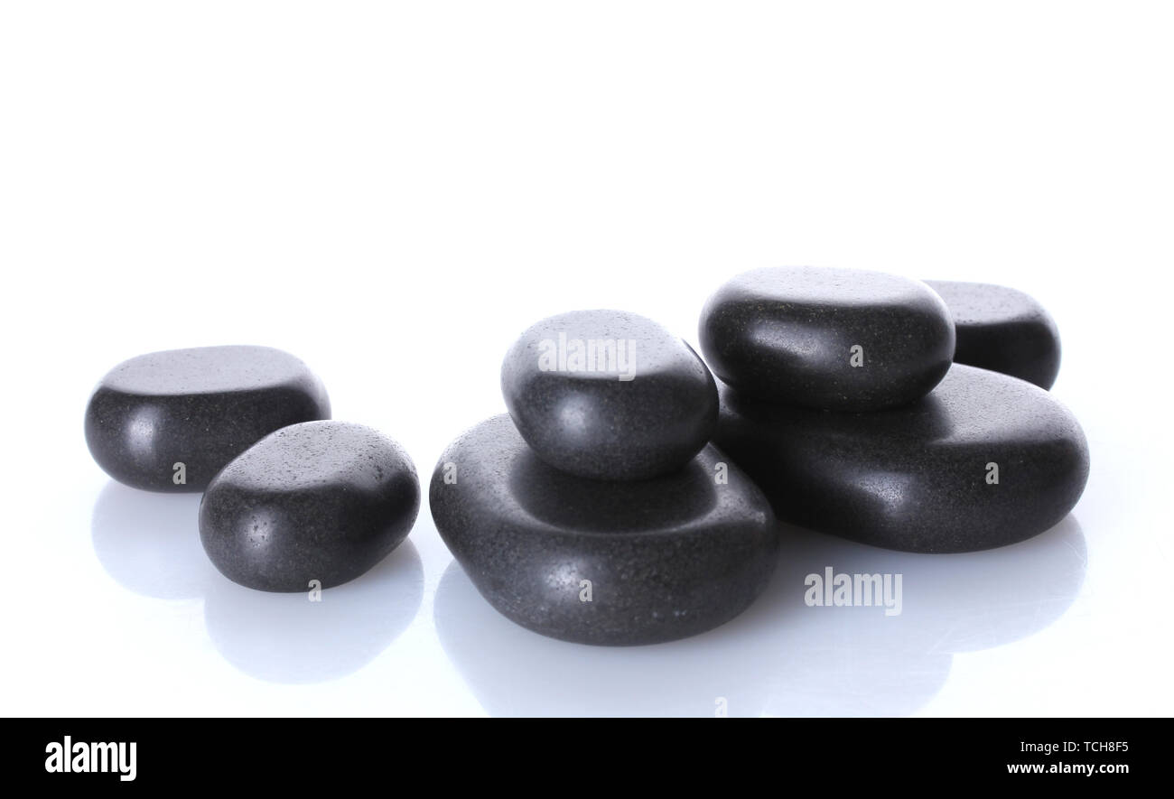 Spa stones isolated on white Stock Photo - Alamy