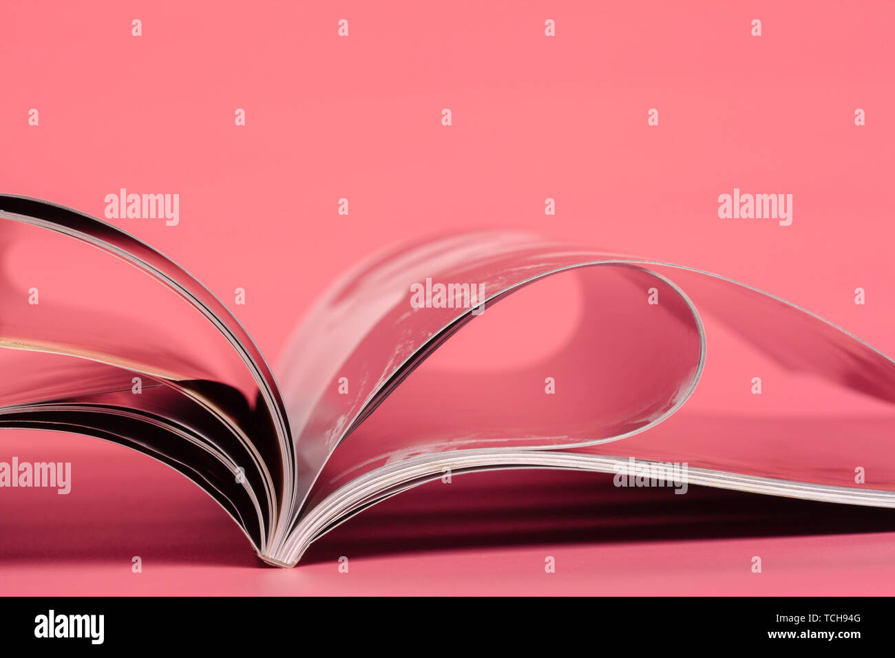 magazines on a pink background Stock Photo - Alamy