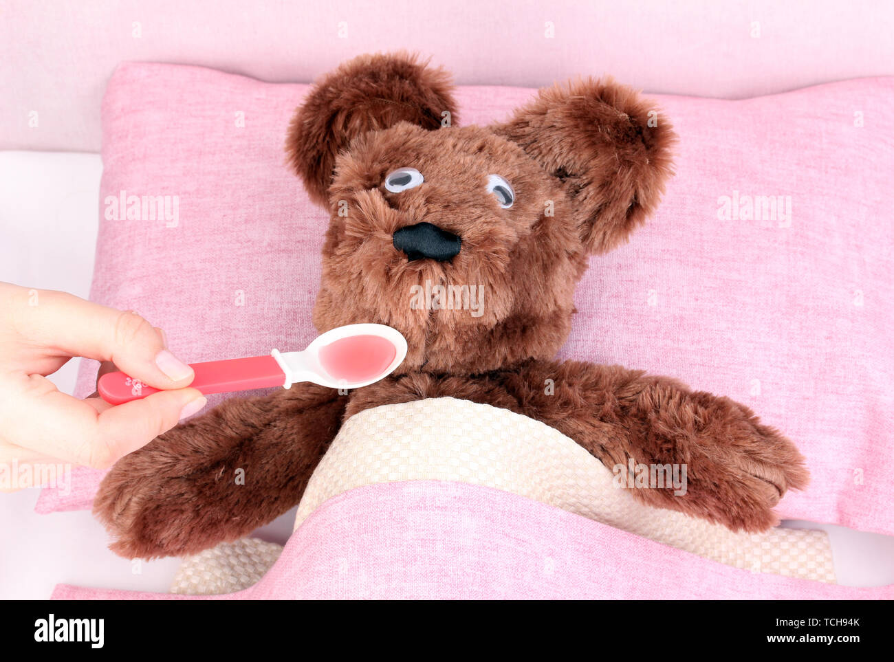 Sick bear in bed Stock Photo - Alamy