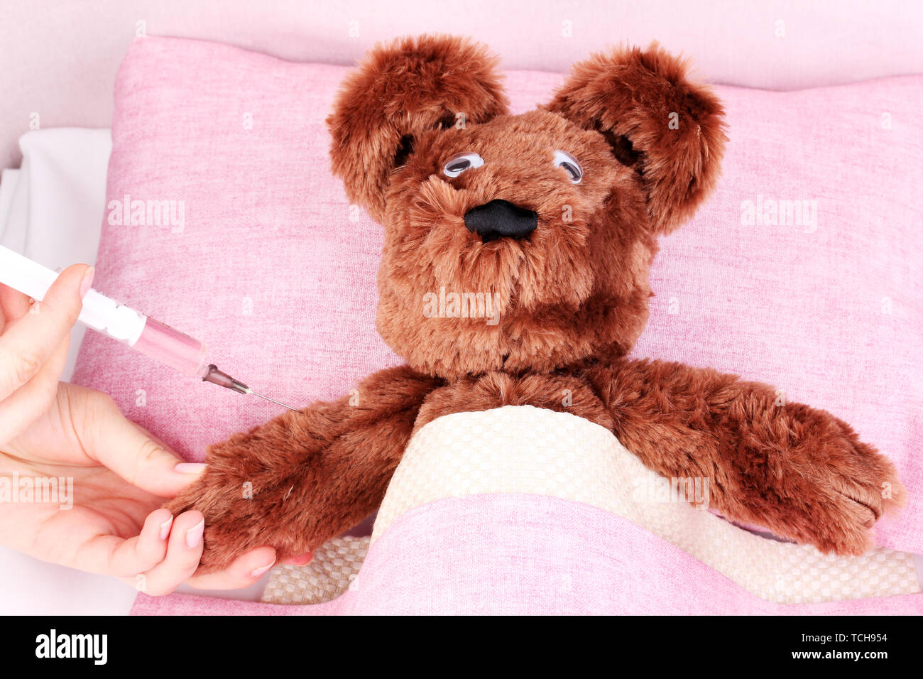 Sick bear in bed Stock Photo - Alamy