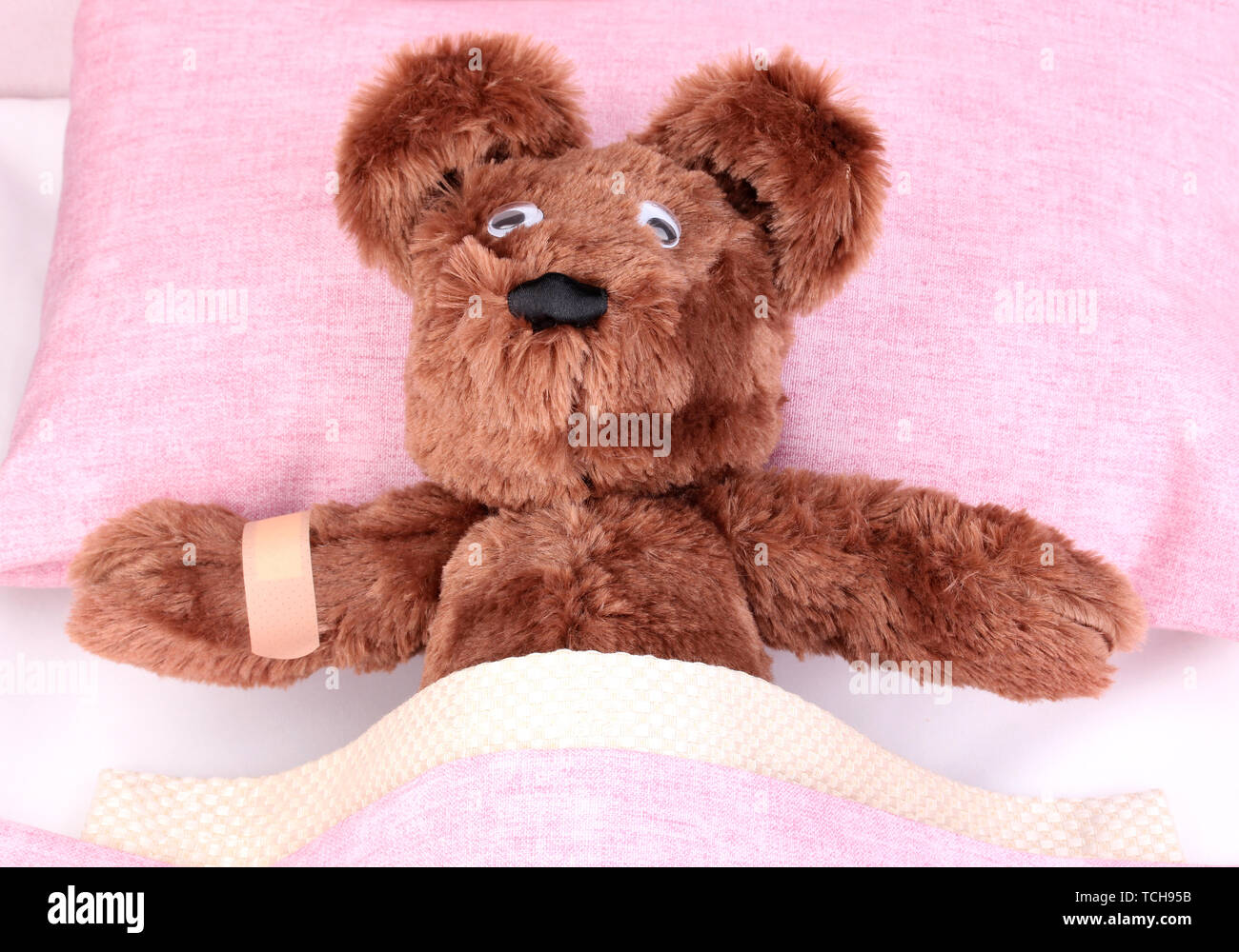 Sick bear in bed Stock Photo - Alamy