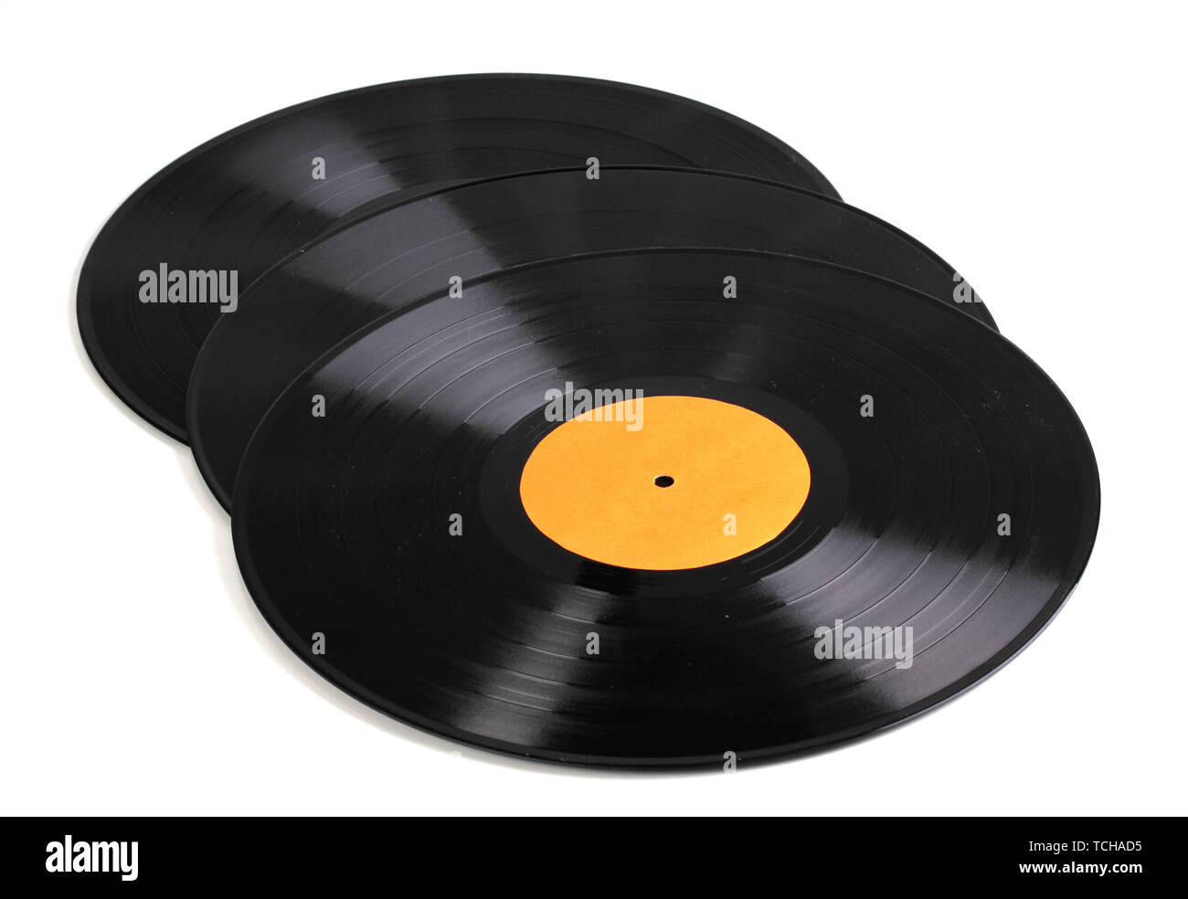 Black vinyl records isolated on white Stock Photo - Alamy