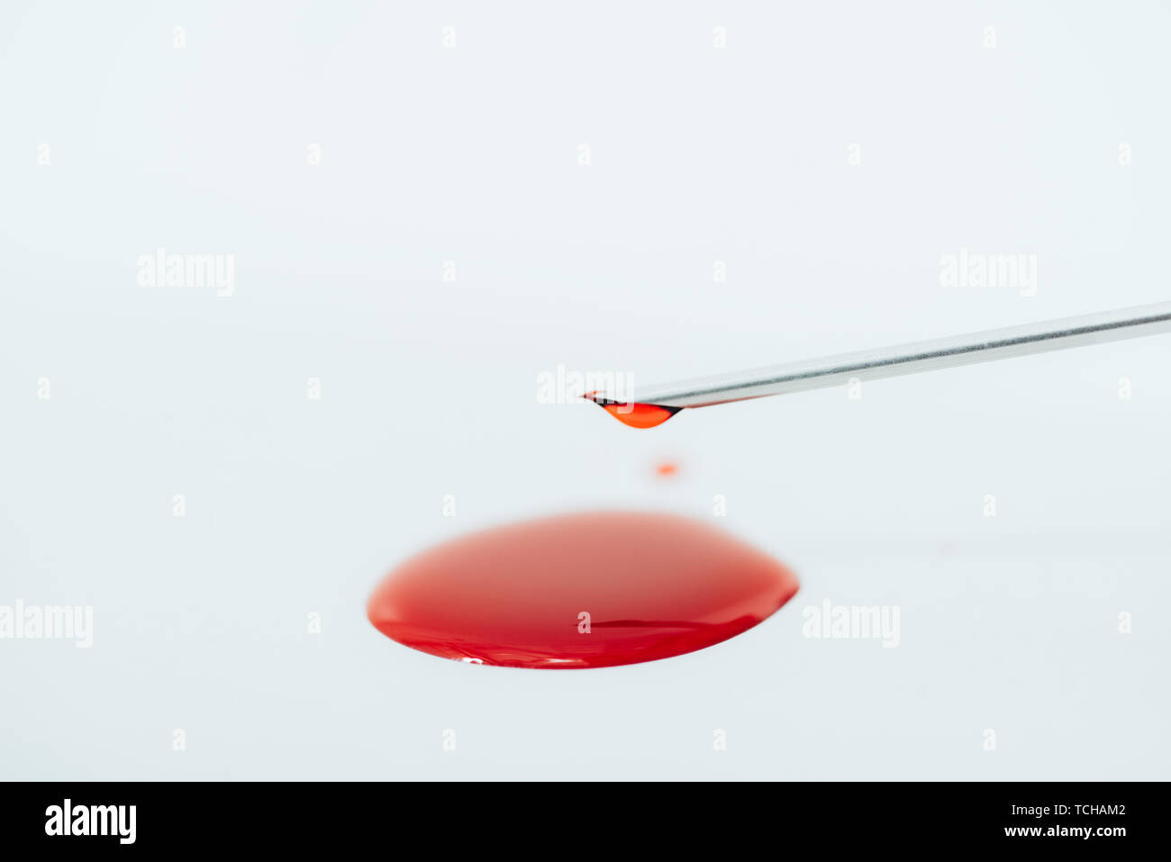 syringe needle and blood stain isolated on white Stock Photo - Alamy