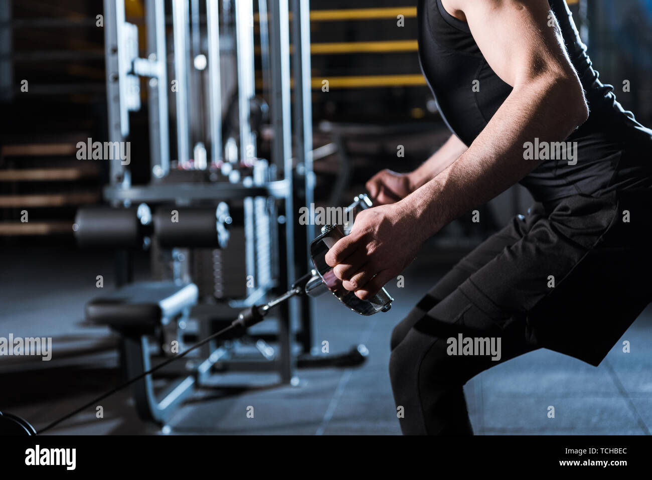 Man on training apparatus hi-res stock photography and images - Alamy
