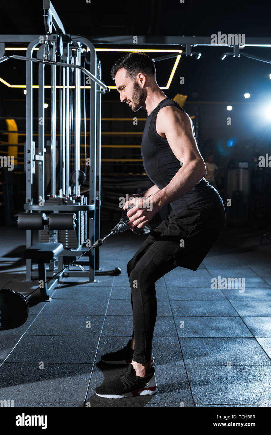 Man on training apparatus hi-res stock photography and images - Alamy