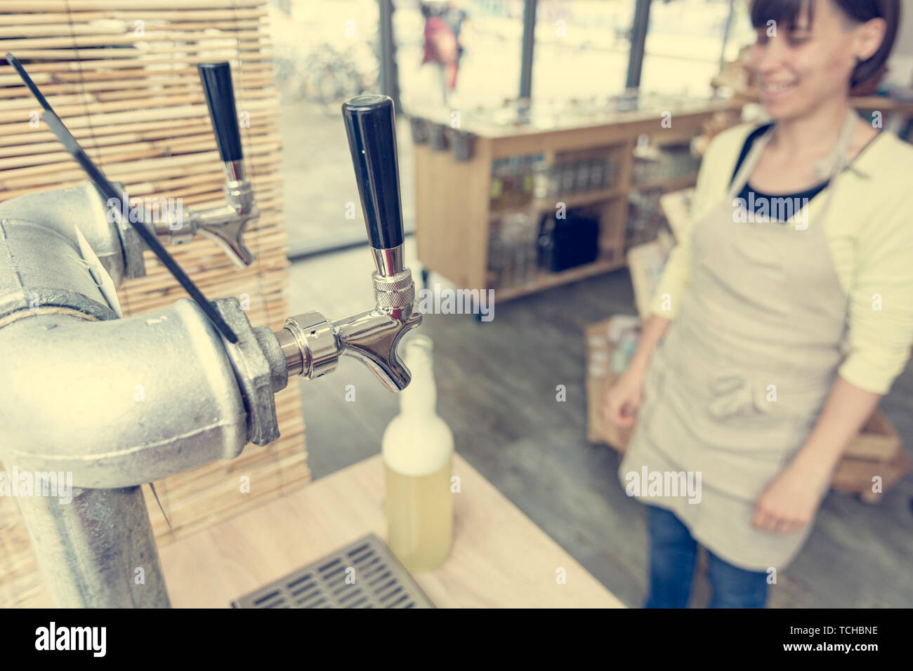Female pouring beer in hi-res stock photography and images - Alamy