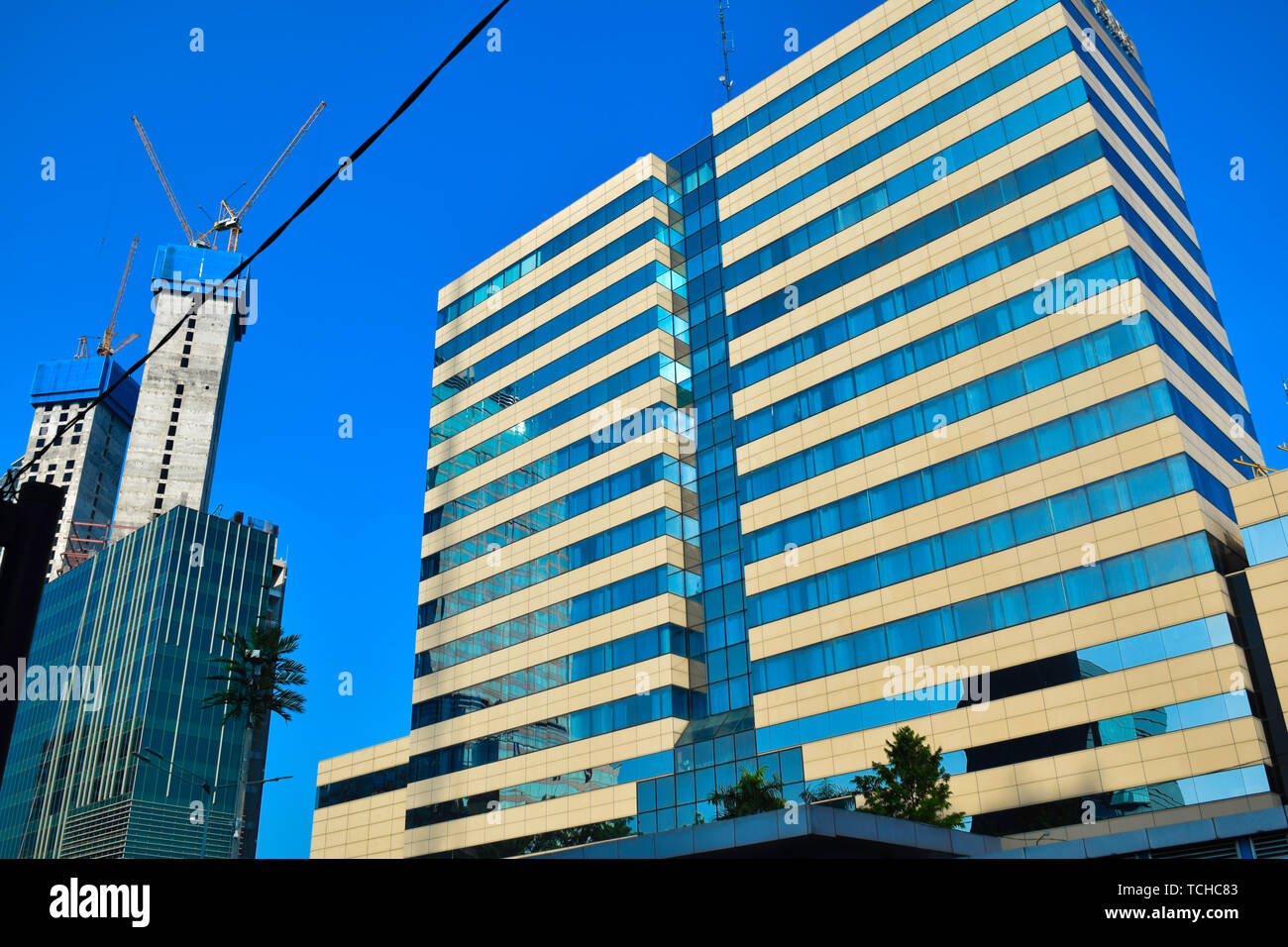 modern glass and steel office buildings low angle view at Jakarta ...