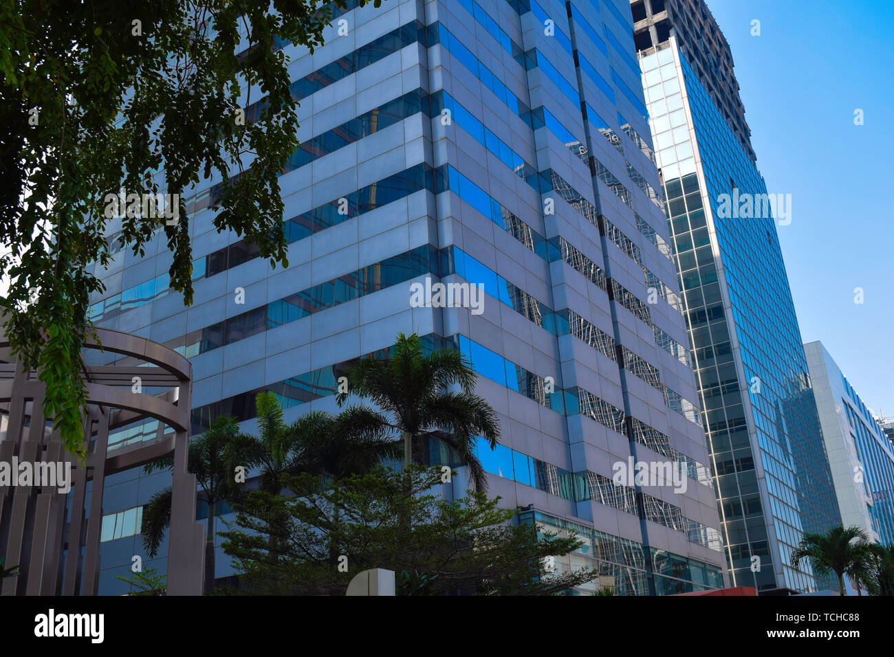 modern glass and steel office buildings low angle view at Jakarta ...