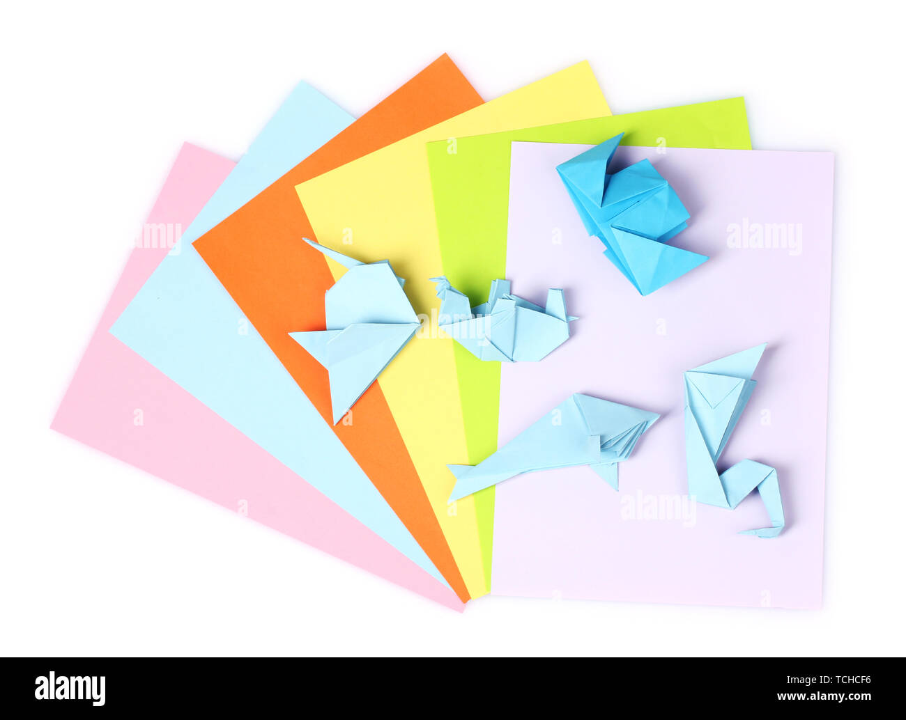 blue origami on bright paper, isolated on white Stock Photo - Alamy