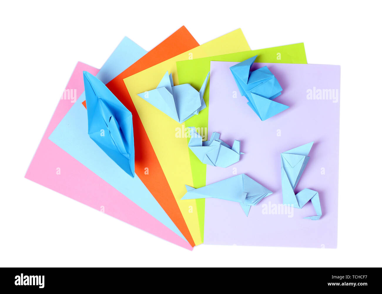 blue origami on bright paper, isolated on white Stock Photo - Alamy