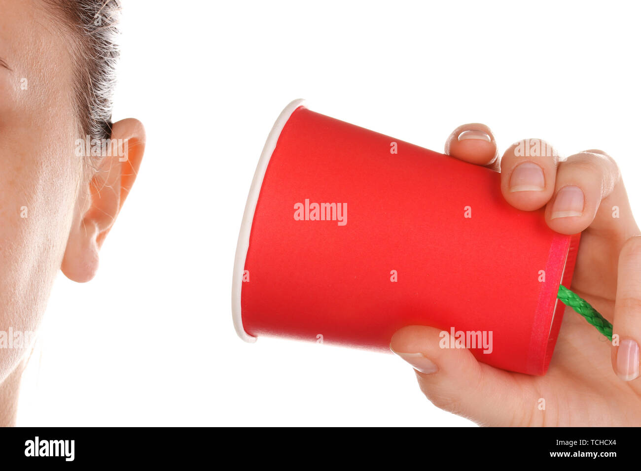 Human ear and paper cup near it close-up isolated on white Stock Photo ...