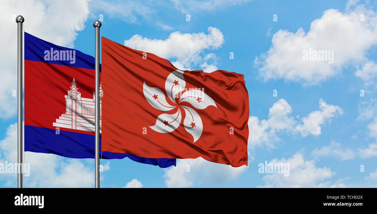 Cambodia and Hong Kong flag waving in the wind against white cloudy ...