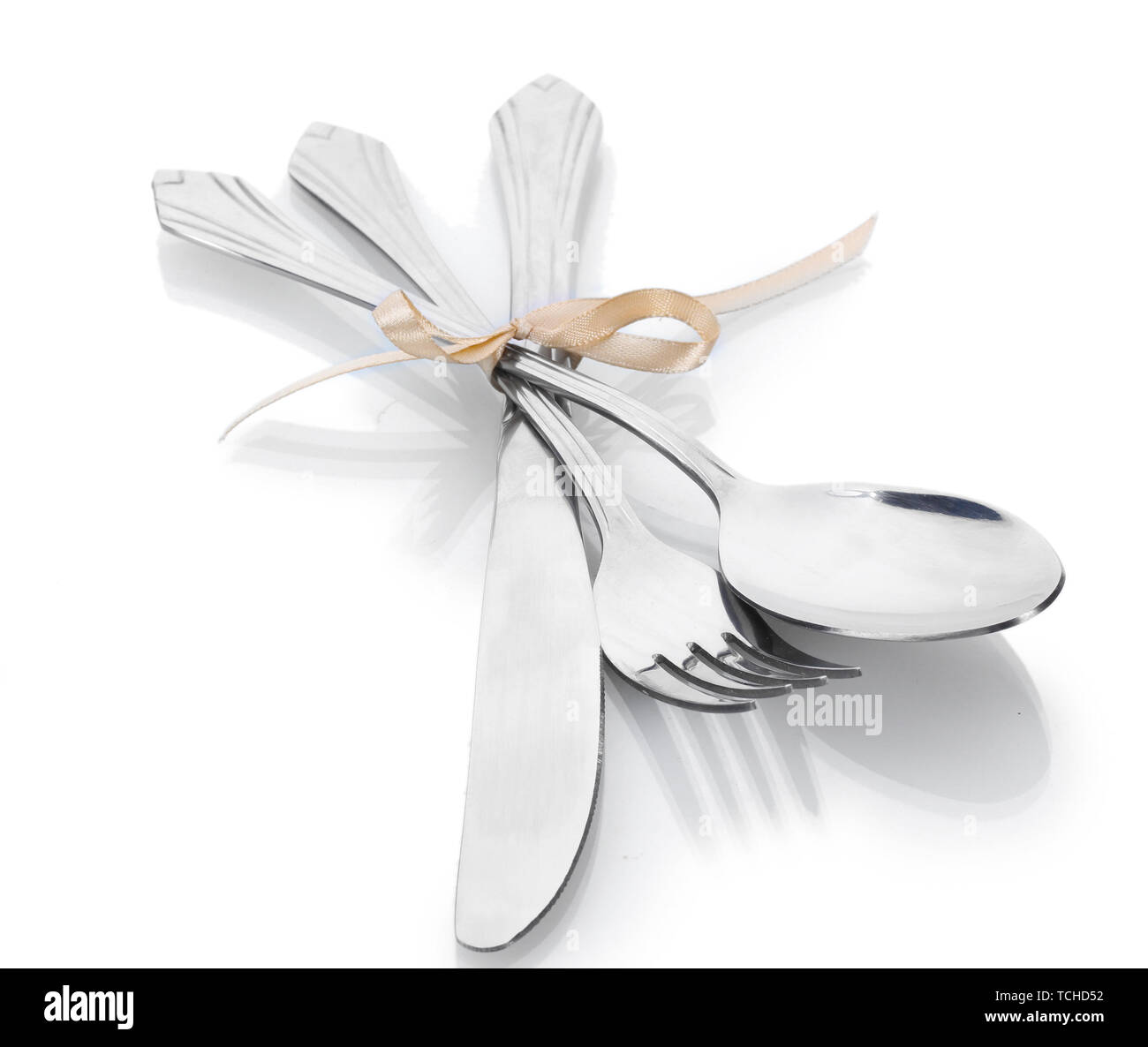 Spoon with ribbon isolated on white hi-res stock photography and images ...
